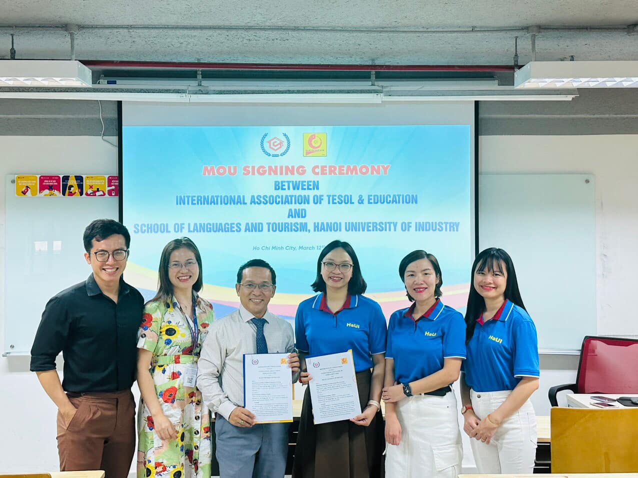 MoU Signing between ICTE Press and the School of Languages and Tourism, Hanoi University of ...